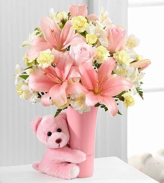 The Baby Girl Big Hug® - Pink Flower Arrangement - Flower Company